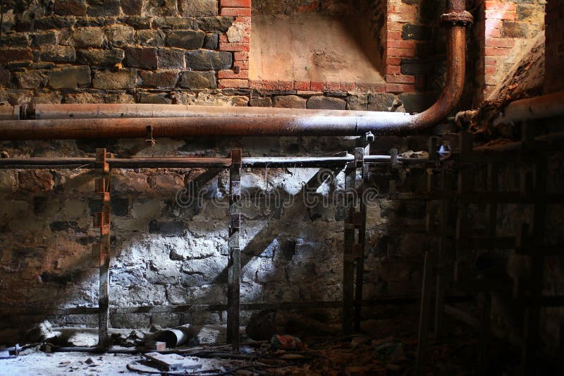 Rusty Pipes in Dark Abandoned Industrial Basement Stock Photo - Image ...