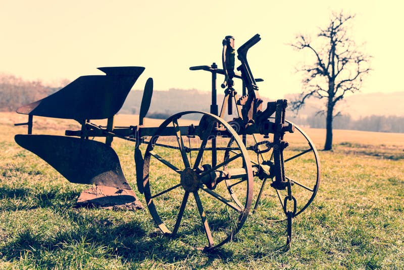 Rusty Plow in the Field, Vintage Filter Stock Image - Image of industry ...