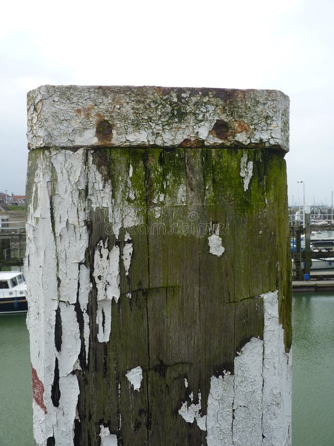 Rusty pole in a harbour stock image. Image of houses - 51446937