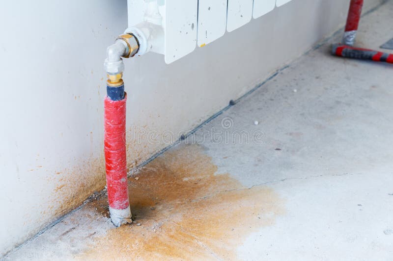 Rusty Puddle, Battery Pipe Wrapped with Electrical Tape Leaking Heating ...