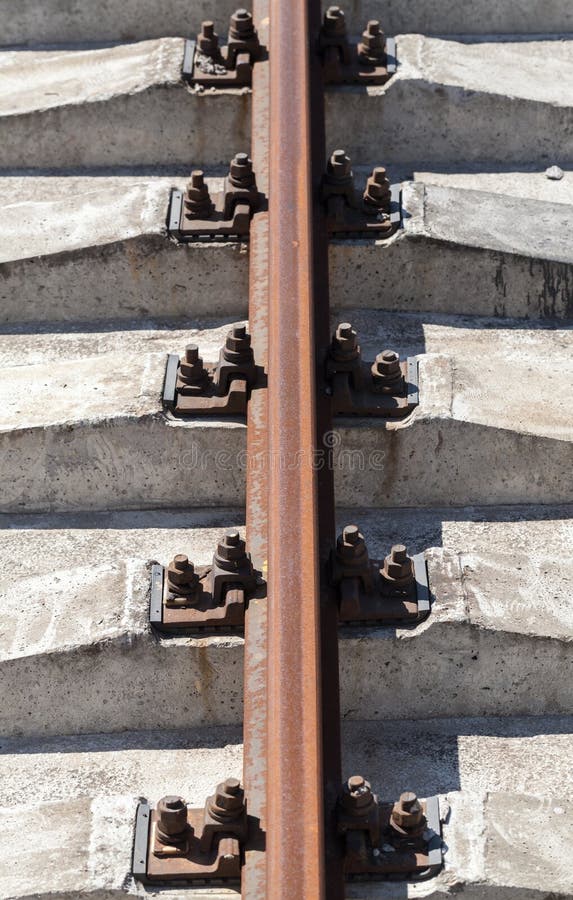 Rusty Rail on Concrete Sleepers. Vertical Photo Stock Image - Image of ...