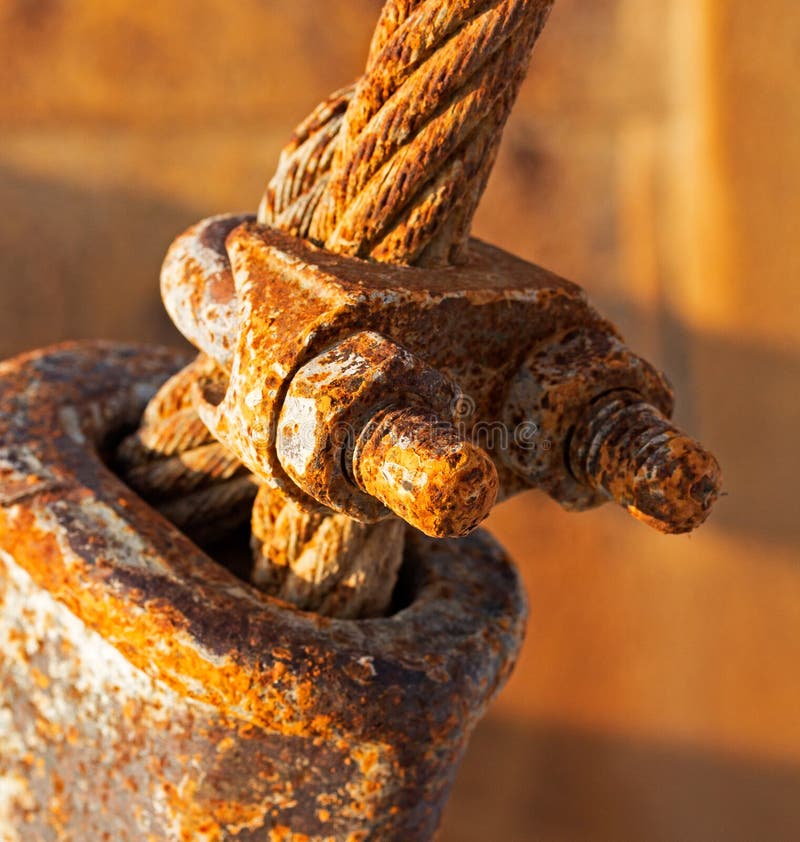 Rusty and a Rope in Sunlight Stock Photo - Image of textured, isolated ...