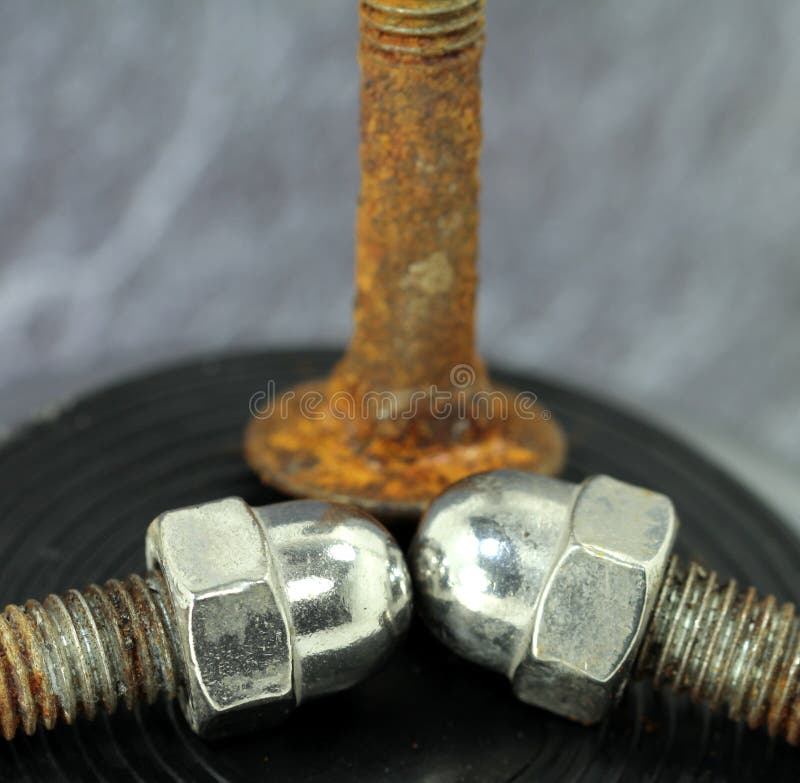 Rusty Screws with Hat Nut Made of Chrome Stock Photo - Image of macro ...