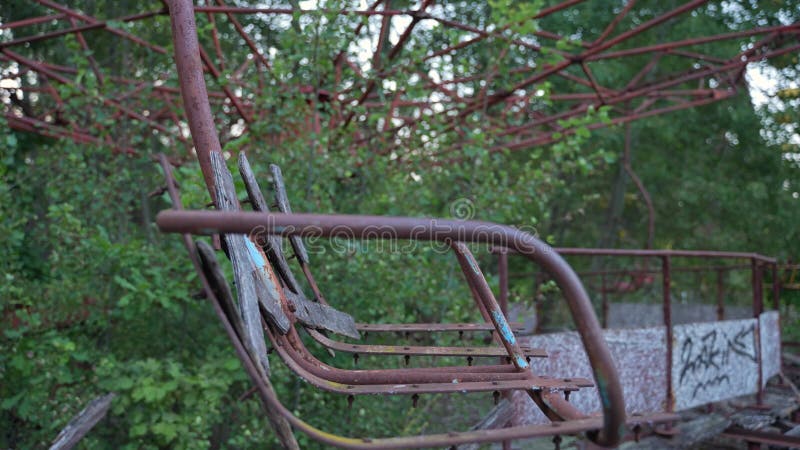 Abandoned Carousel and Ferris Wheel in an Amusement Park in a Deserted ...