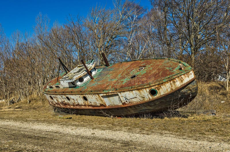 Tilting Rusting Ship stock photo. Image of boat, green - 112240650