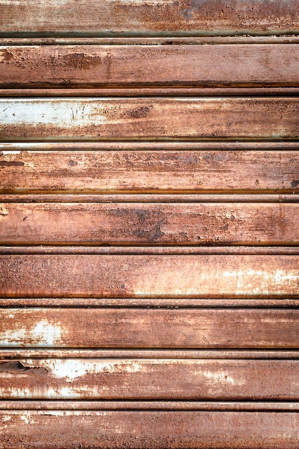 Rusty shutter grunge stock photo. Image of metallic - 233379798