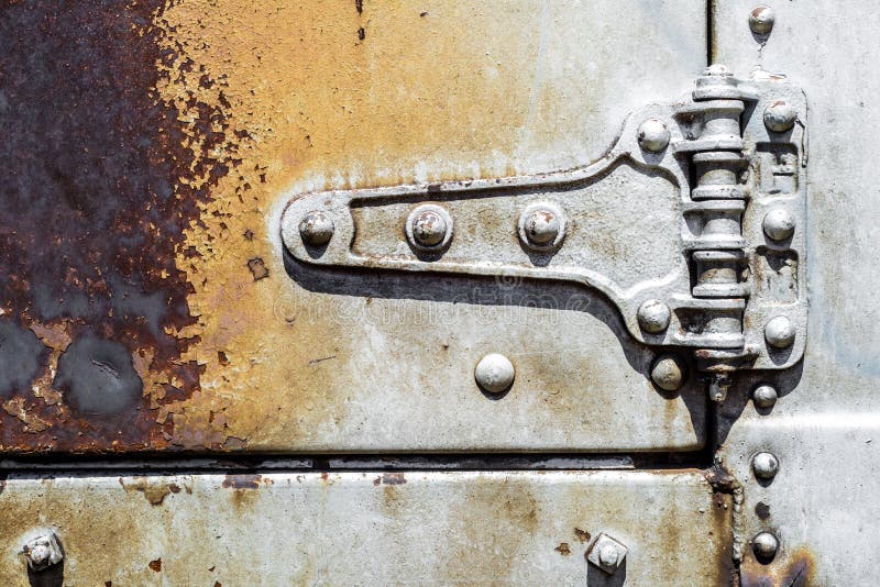 Rusty Silver Chain on a Rocky Shore Area Near Colorful Buildings in ...