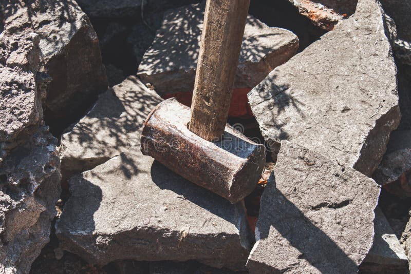 Rusty Sledgehammer on Broken Bricks and Concrete Stones Stock Image ...
