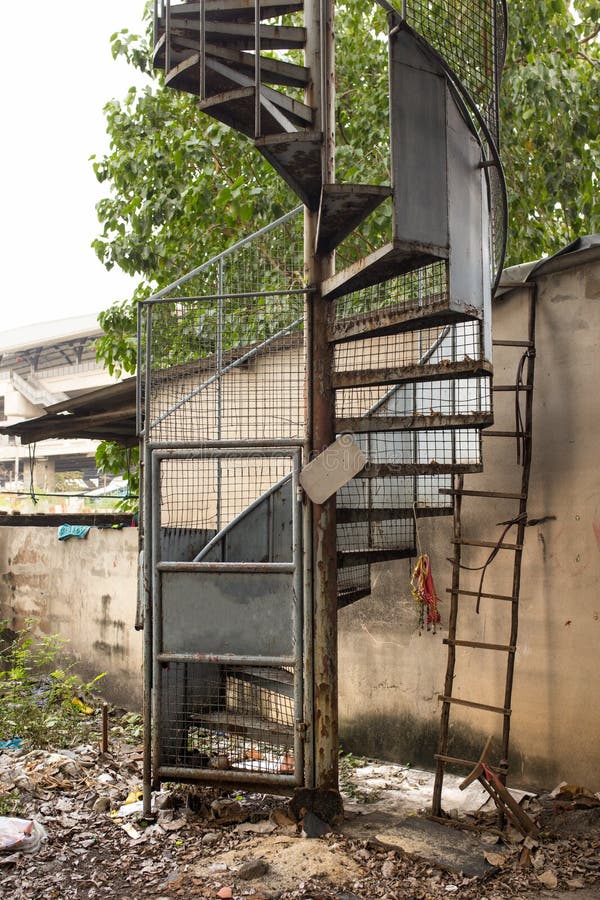 Rusty spiral staircase stock photo. Image of light, building - 108368464