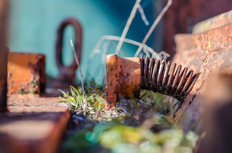 Rusty Spring of Machine with Plants Stock Image - Image of places ...