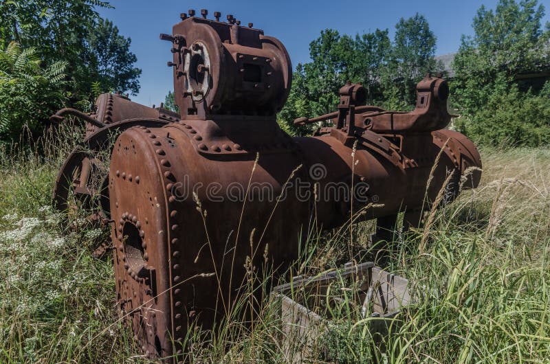 Rusty Steam Engine on a Terrain Stock Photo - Image of construction ...