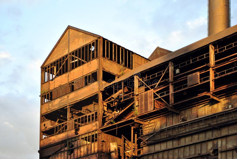 Old Dilapidated Rusty Factory Hall in Bright Sunlight Stock Image ...