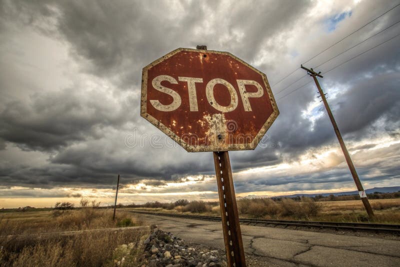 Rusty STOP Sign Held High a Call for Caution and Halt - Generated by Ai ...
