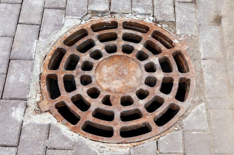 Rusty Storm Sewer Hatch. Rusty Storm Drain Stock Image - Image of hatch ...