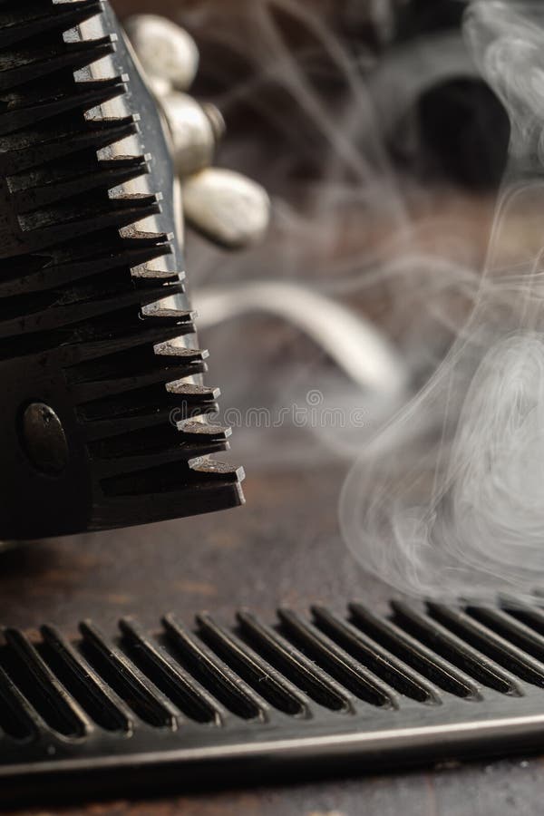 On a Rusty Surface Manual Clipper and Comb. Close Up. Rustic Stock ...