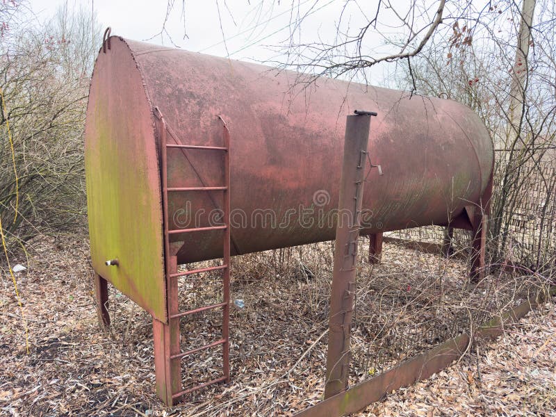 A Rusty Tank with a Ladder on Top of it Stock Image - Image of ...