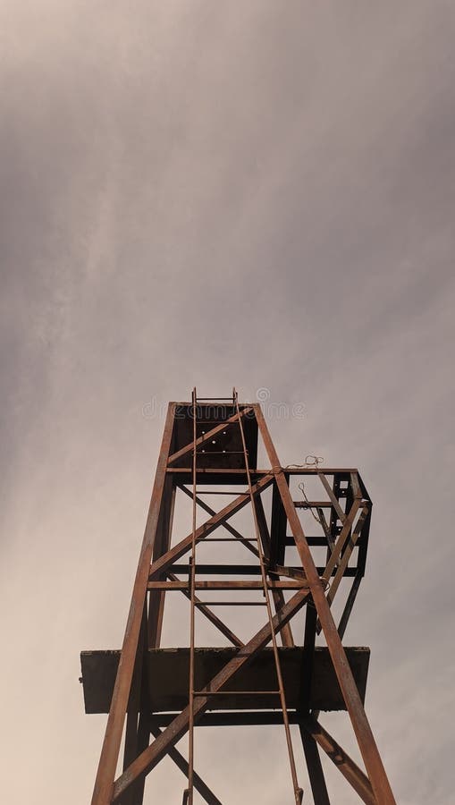 Rusty tower afternoon stock image. Image of cloud, noon - 282224989