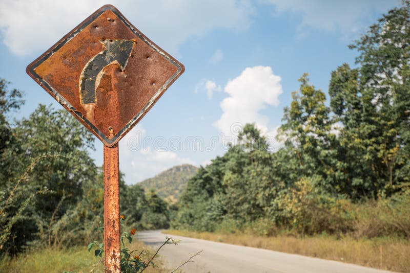 Rusty traffic warning sign stock photo. Image of rocks - 14400380