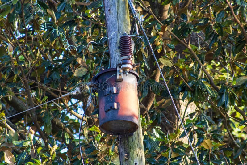 Rusty Transformer on Utility Pole Stock Photo - Image of pole, wood ...