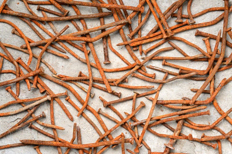 Rusty Nails on a Cement Metal Background Stock Photo - Image of ...