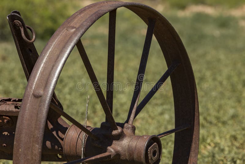Rusty Wagon Wheel stock photo. Image of grass, historic - 95459882