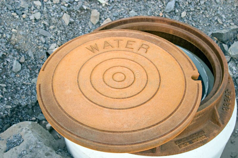 Rusty Water Cover stock image. Image of hole, water, rusty - 4050017