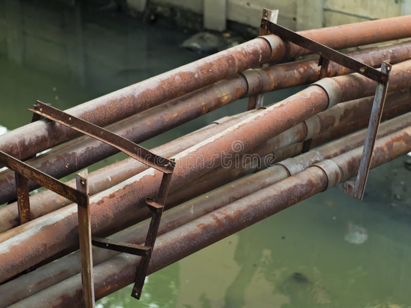 Rusty water pipes stock image. Image of drain, corroded - 77809423
