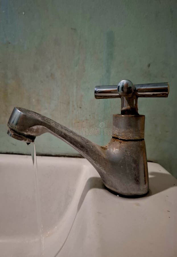 A Rusty Water Tap in an Old Building Stock Image - Image of water ...