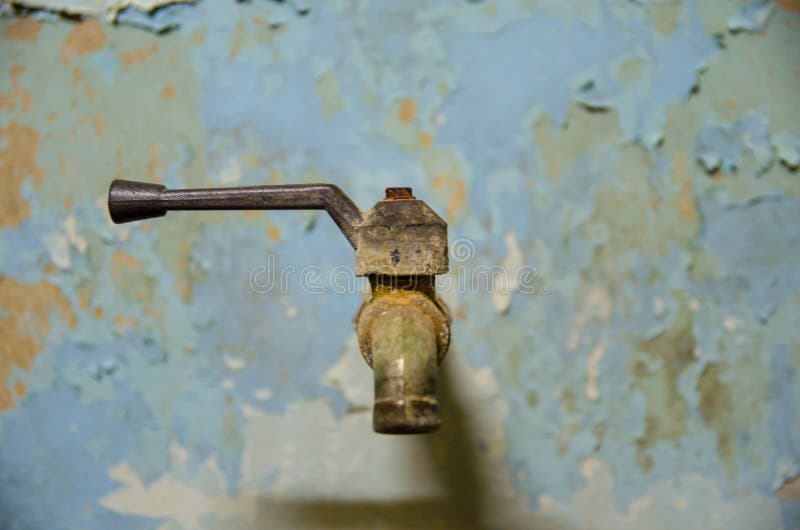 Rusty Water Tap on Pale Wall in Front View Stock Photo - Image of rust ...