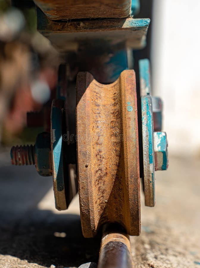 A Rusty Wheel from Sliding Gate on a Rail Stock Image - Image of roller ...