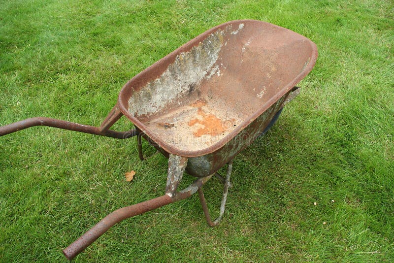Rusty wheelbarrow stock photo. Image of outside, rusty - 148400