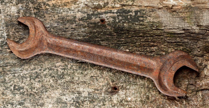 Rusted Wrench Over Corroded Iron Plate Stock Photo - Image of brown ...