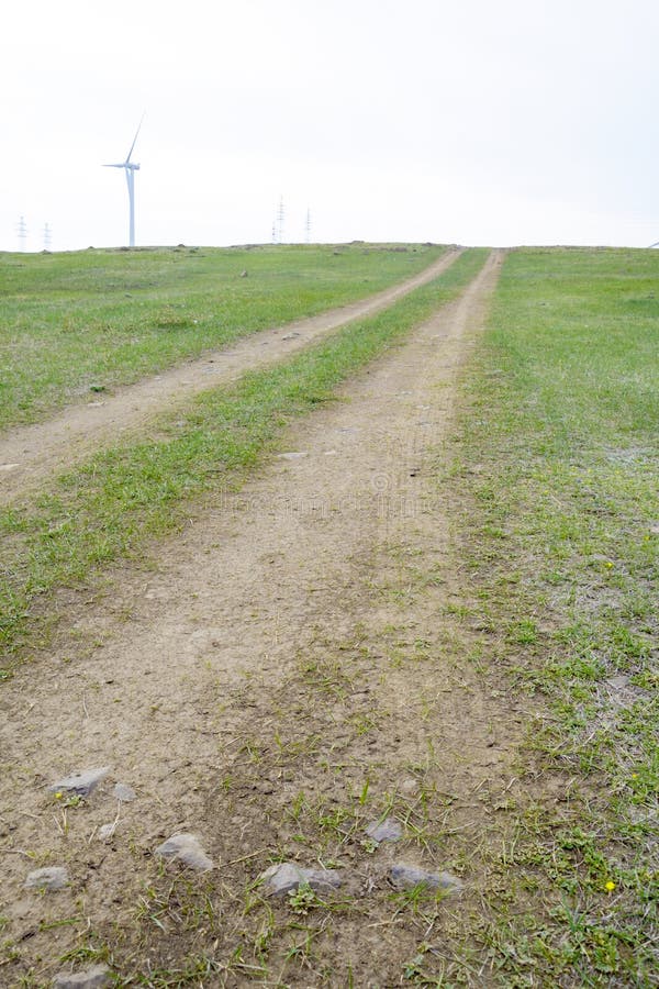 Rutting path in grassland stock photo. Image of marks - 71477038