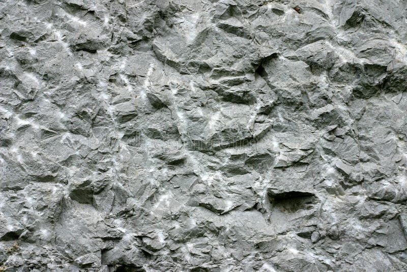 Ruwe rotsmuur stock afbeelding. Image of architectuur, rots - 30699