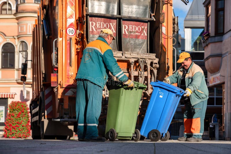 Process of Garbage Loading To the Garbage Truck. Garbage Collectors ...