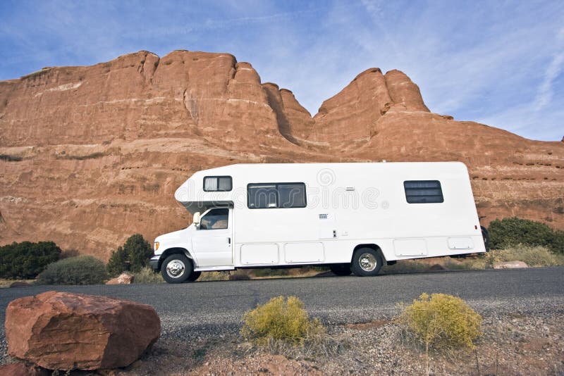 RV in front of red rocks stock photo. Image of moab, canyonlands - 6041668