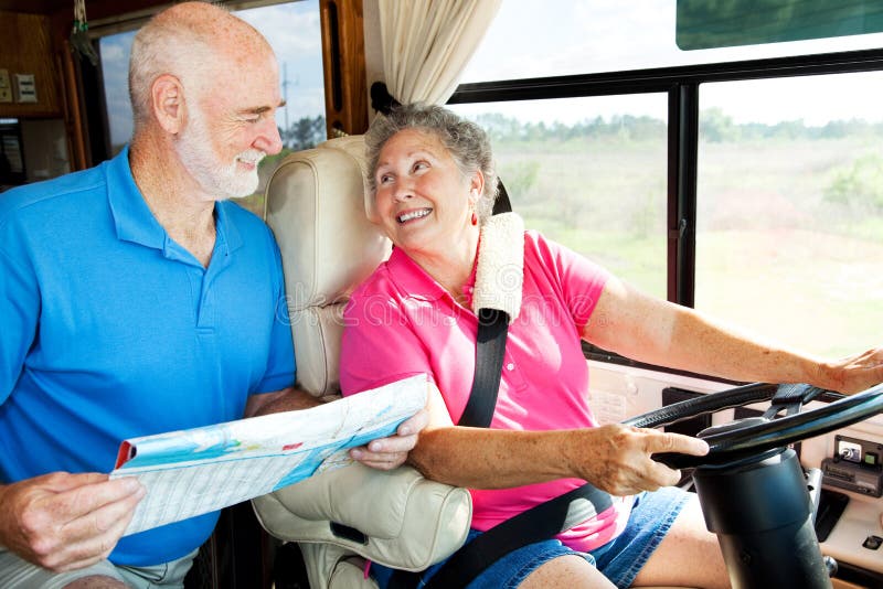 RV Seniors Reading Map stock photo. Image of male, seat - 9582286