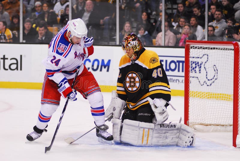 Tuukka Rask makes a save editorial stock image. Image of puck - 22373639