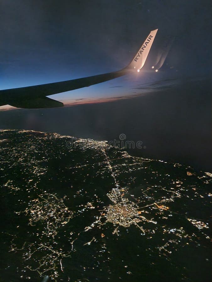 Ryanair flight at sunset editorial stock photo. Image of flight - 277359148
