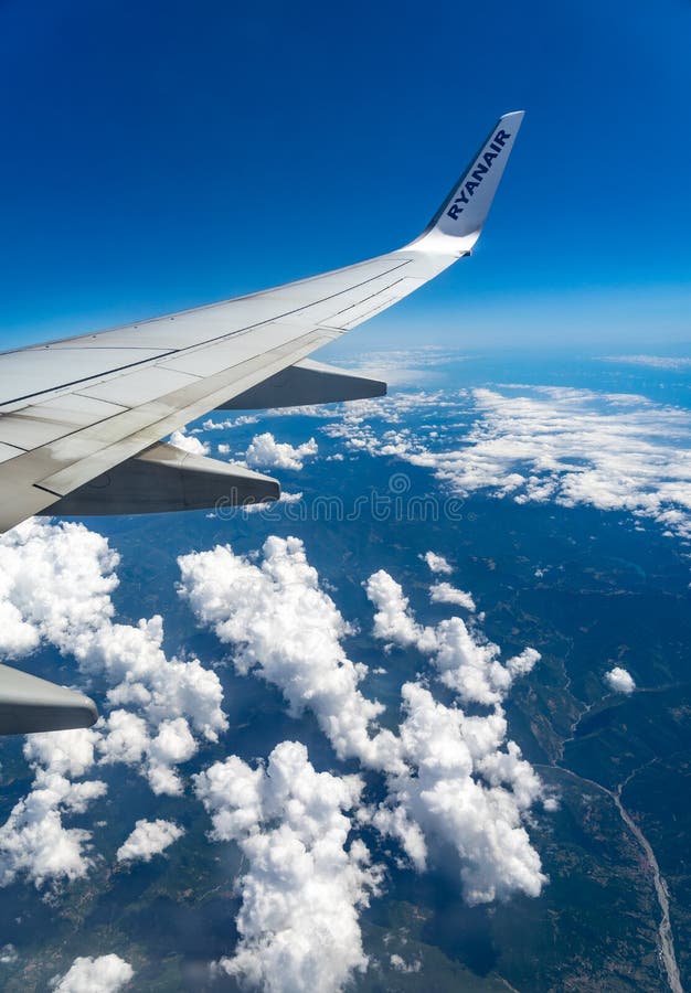 Flying and Traveling, View from Airplane Window on the Wing on Sunset ...