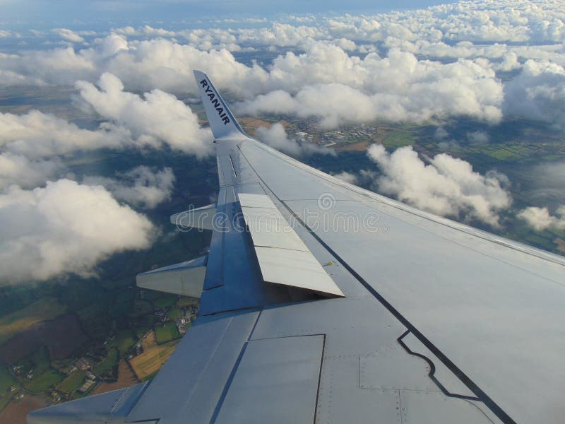 Ryanair Wing Tip on Aircraft Over Clouds. Editorial Photography - Image ...