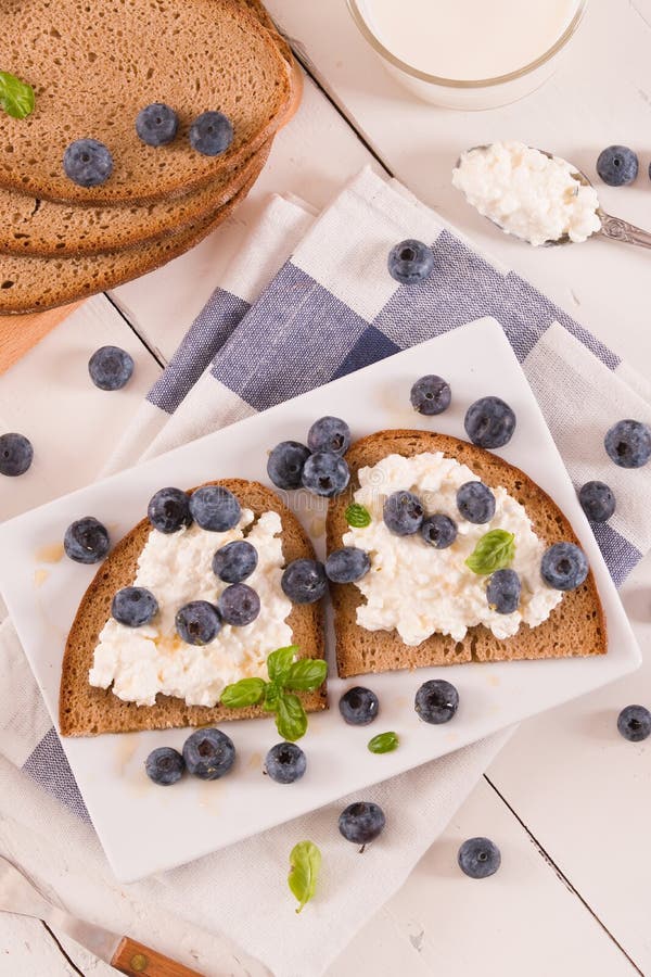 Rye Bread with Cottage Cheese, Blueberries and Honey. Stock Image ...