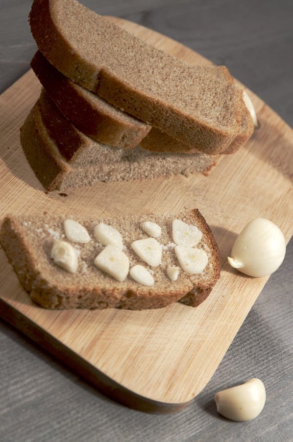 Rye Bread with Garlic and Salt Stock Photo - Image of board, appetizer ...