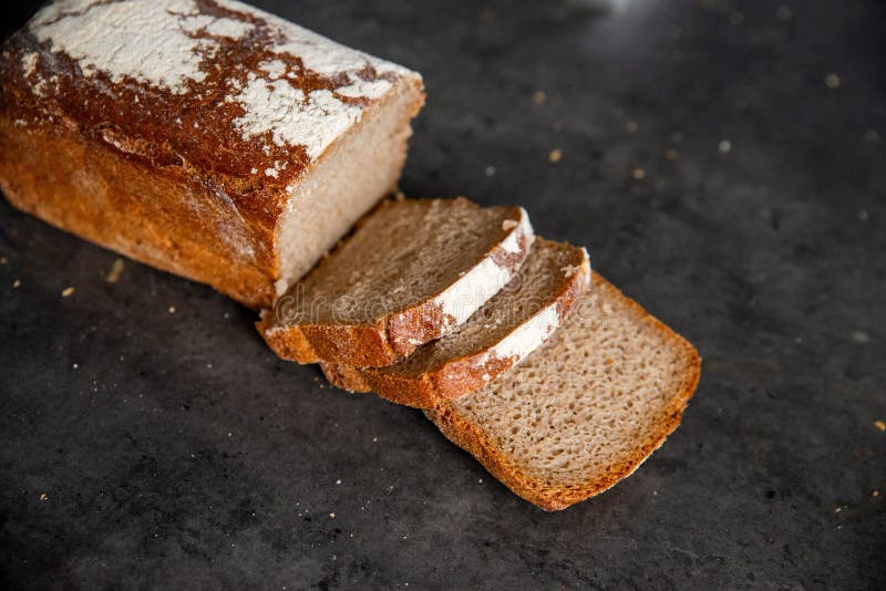 Rye Bread, Sourdough, Cut into Pieces, Placed on a Stone Counte Stock ...