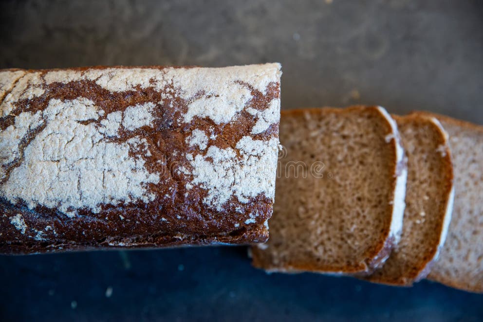 Rye Bread, Sourdough, Cut into Pieces, Placed on a Stone Counte Stock ...