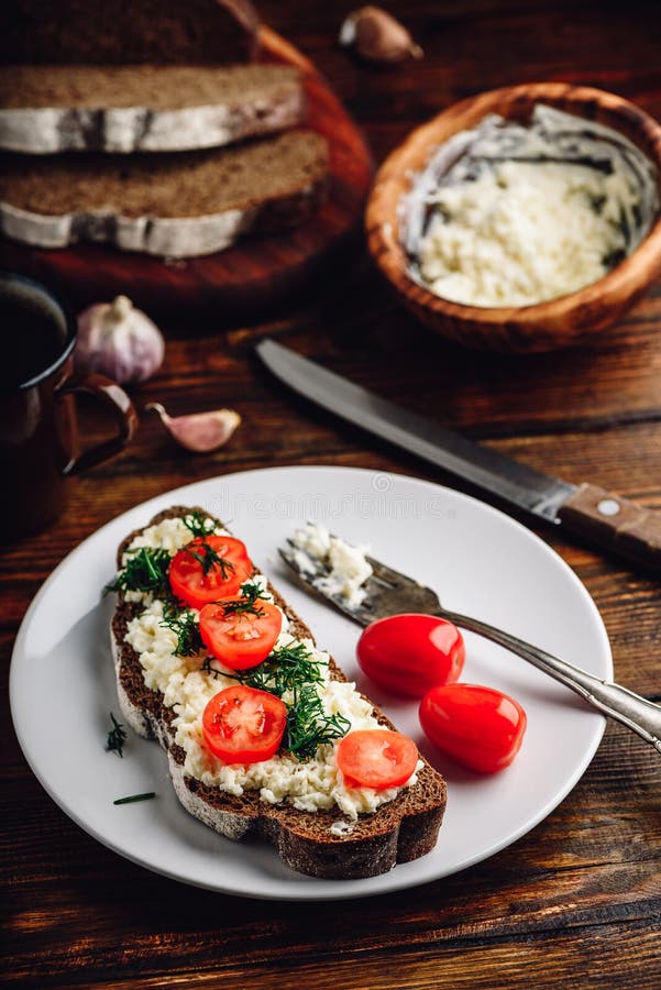 Rye Bread Toast with Processed Cheese, Garlic and Tomatoes Stock Image ...