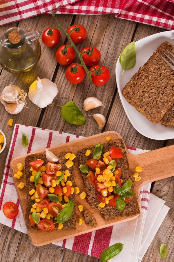 Rye Bread Withsweet Corn, Basil and Tomato. Stock Image - Image of ...