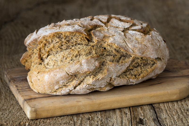 Rye bread on wood stock image. Image of fresh, pastry - 208449219