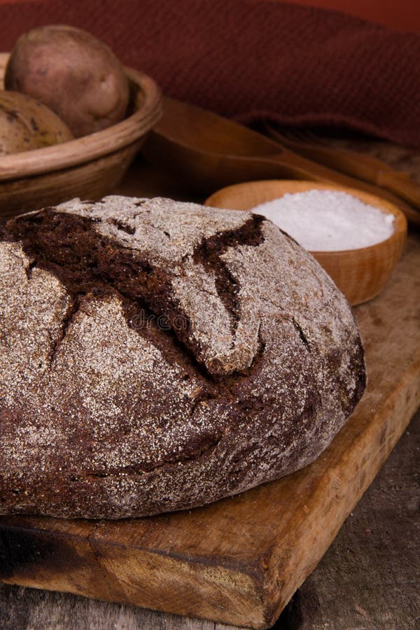 Rye Bread on a Wooden Board Stock Photo - Image of salt, dark: 44327568