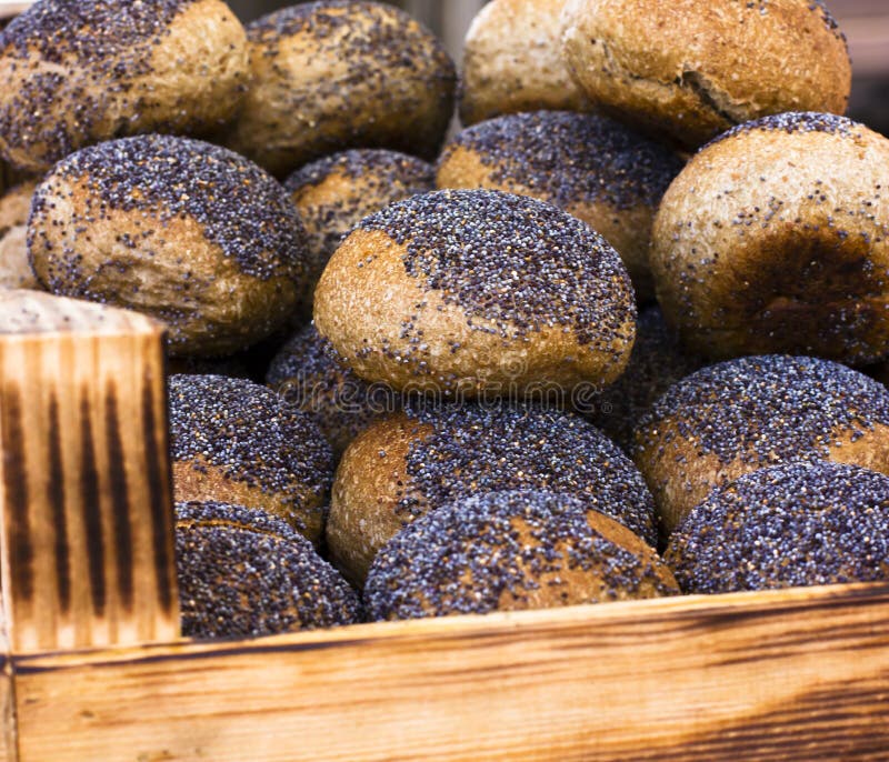 Rye Buns with Poppy Seeds in a Wooden Box Stock Image - Image of black ...
